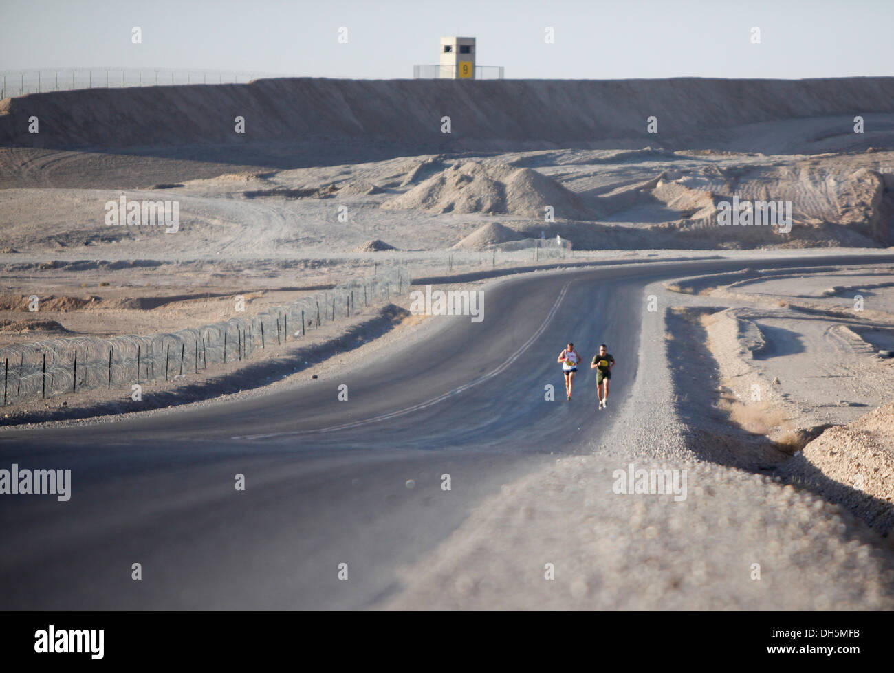 Runners compete in the 2013 Marine Corps Marathon Fowrard at Camp ...