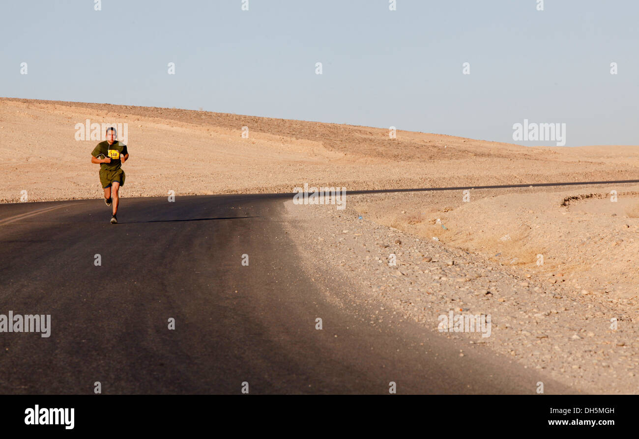 Runners compete in the 2013 Marine Corps Marathon Forward at Camp ...