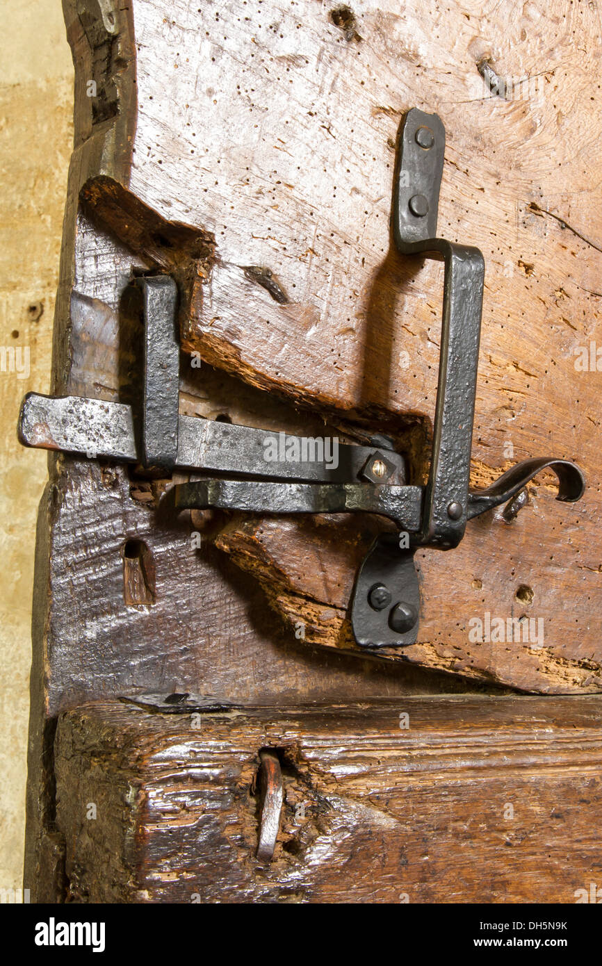 Very old door latch, still in use in an English Church Stock Photo - Alamy