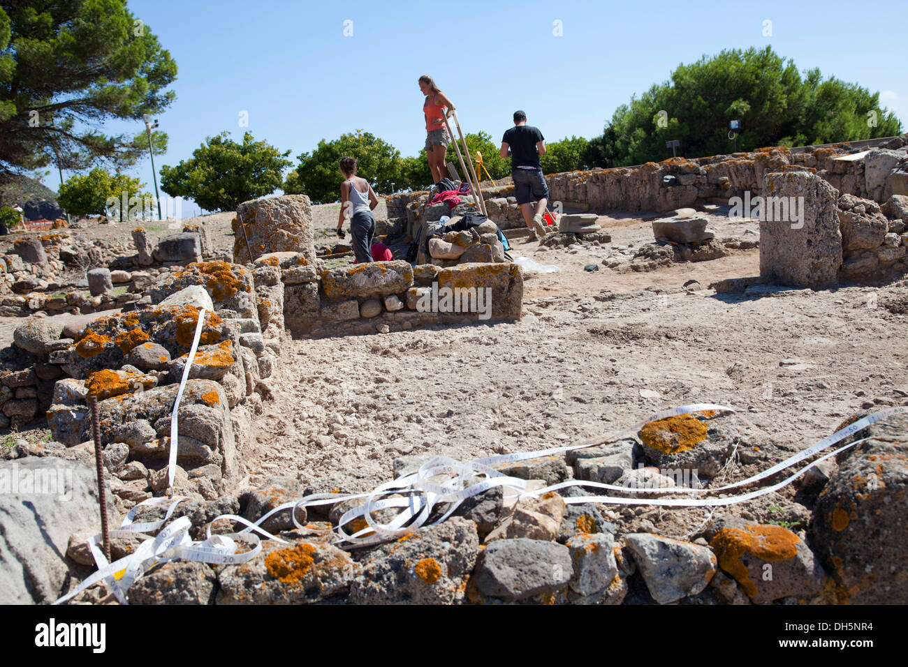 Archaeologists on Site Digging at Nora Ruins in Southern Sardinia Stock ...