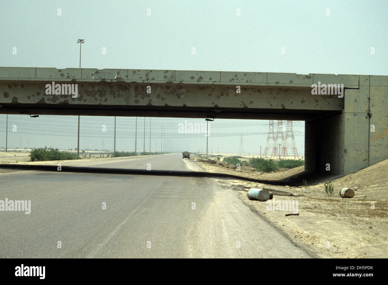 The aftermath of the 1991 Gulf War in Kuwait : a damaged bridge in the ...