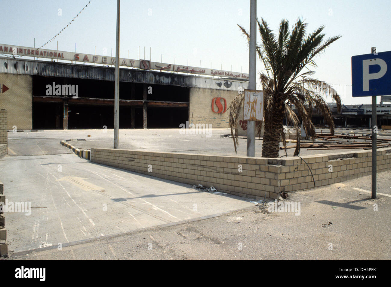 The aftermath of the 1991 Gulf War in Kuwait : a fired commercial ...