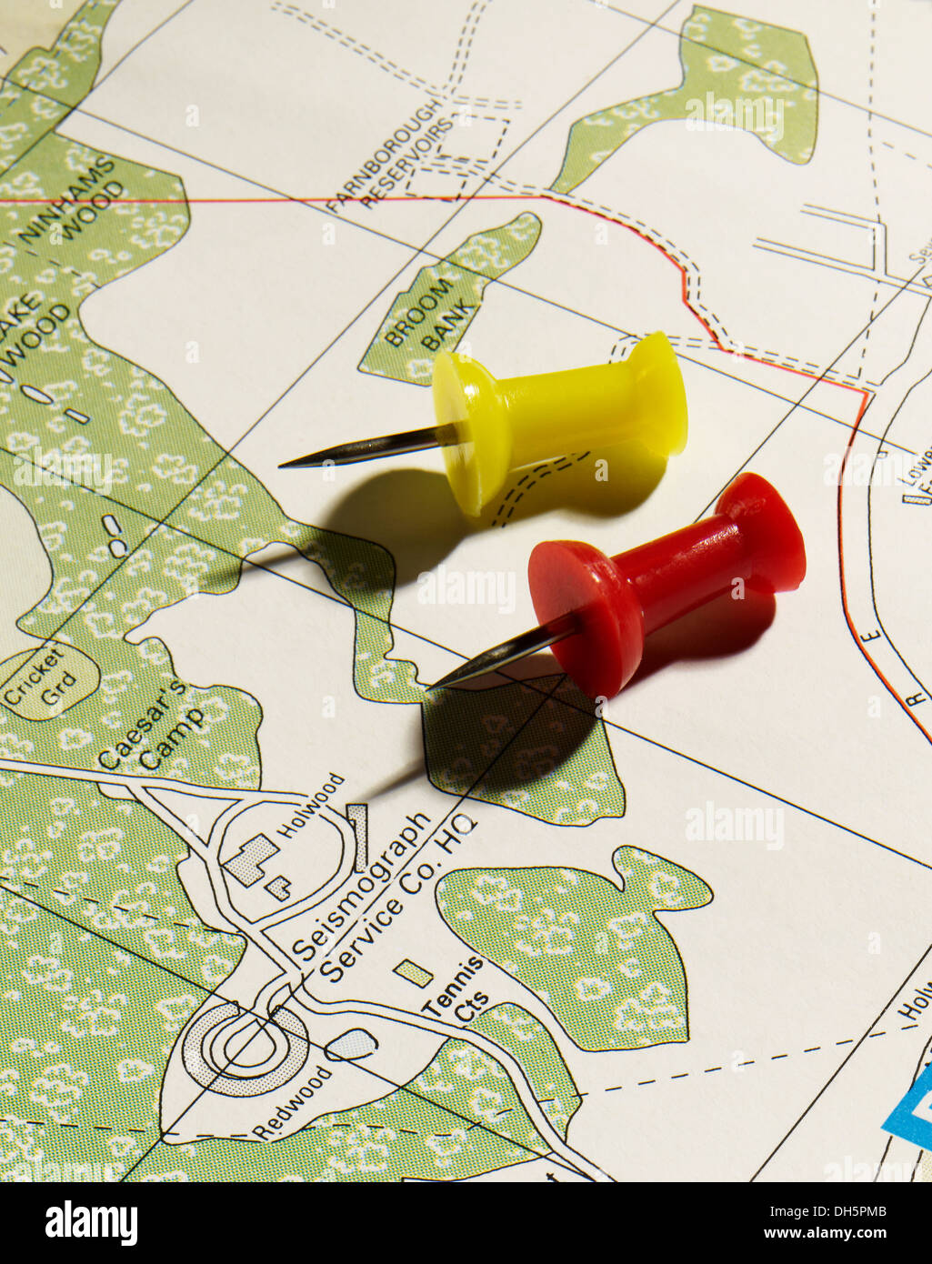 Coloured Map pins on a map with strong shadows Stock Photo - Alamy