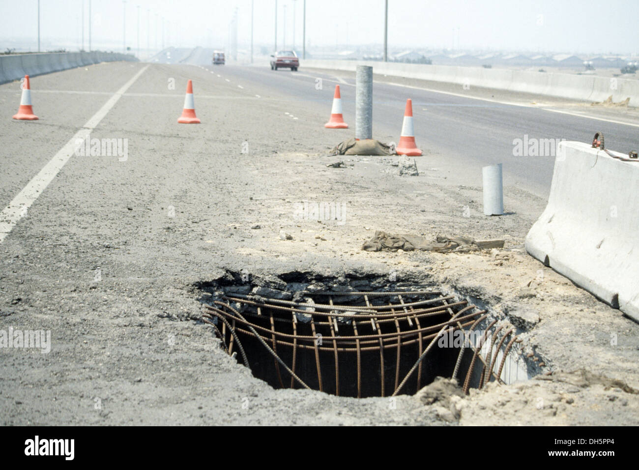 The aftermath of the 1991 Gulf War in Kuwait : bombed highway in ...