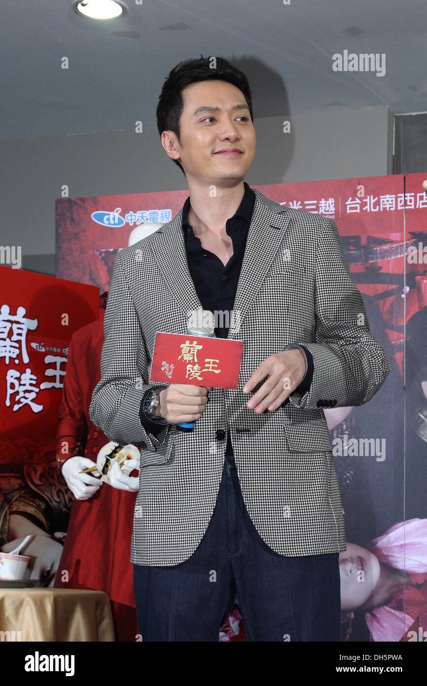 Taipei, China. 31st Oct, 2013. Actor Feng Shaofeng shows the costume he ...