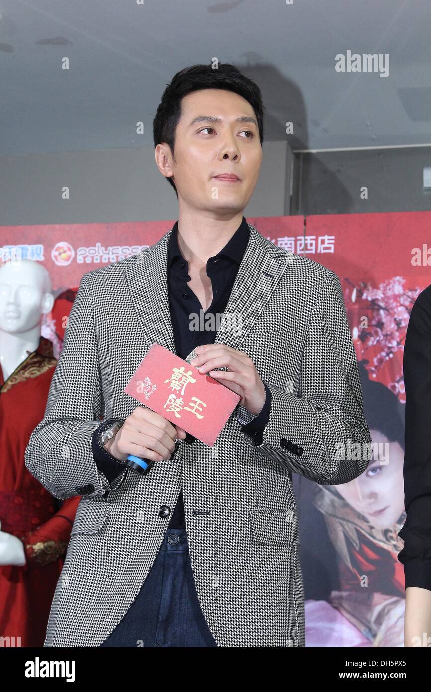 Taipei, China. 31st Oct, 2013. Actor Feng Shaofeng shows the costume he ...