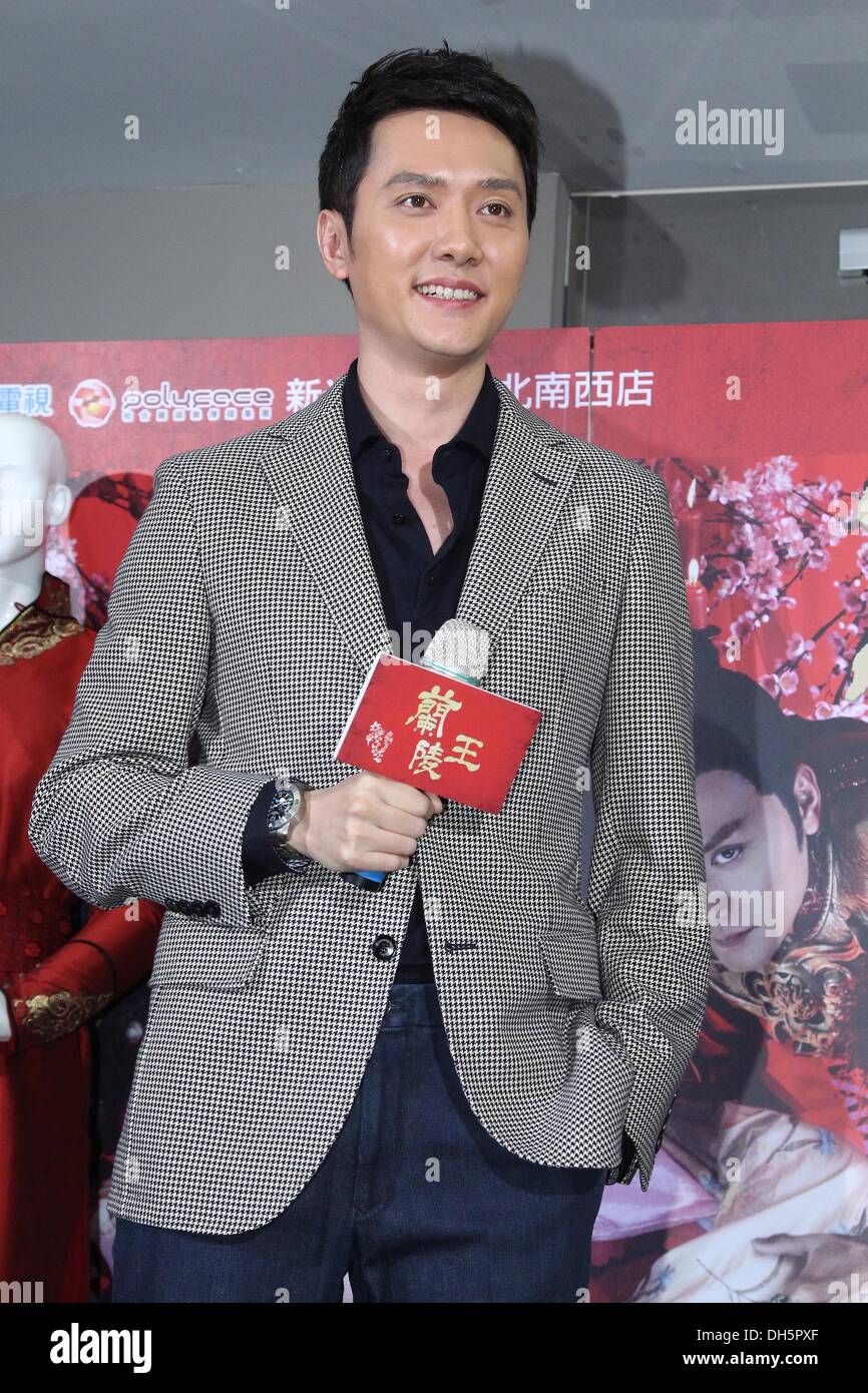 Taipei, China. 31st Oct, 2013. Actor Feng Shaofeng shows the costume he ...