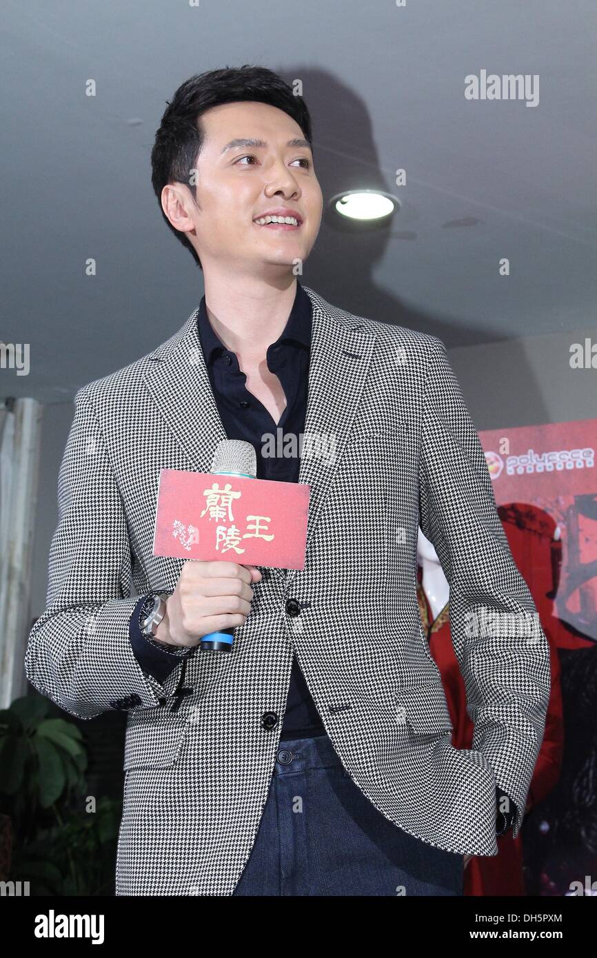 Taipei, China. 31st Oct, 2013. Actor Feng Shaofeng shows the costume he ...