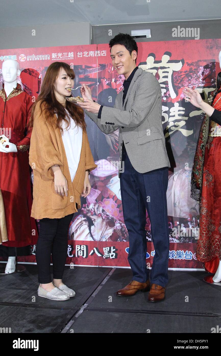 Taipei, China. 31st Oct, 2013. Actor Feng Shaofeng shows the costume he ...
