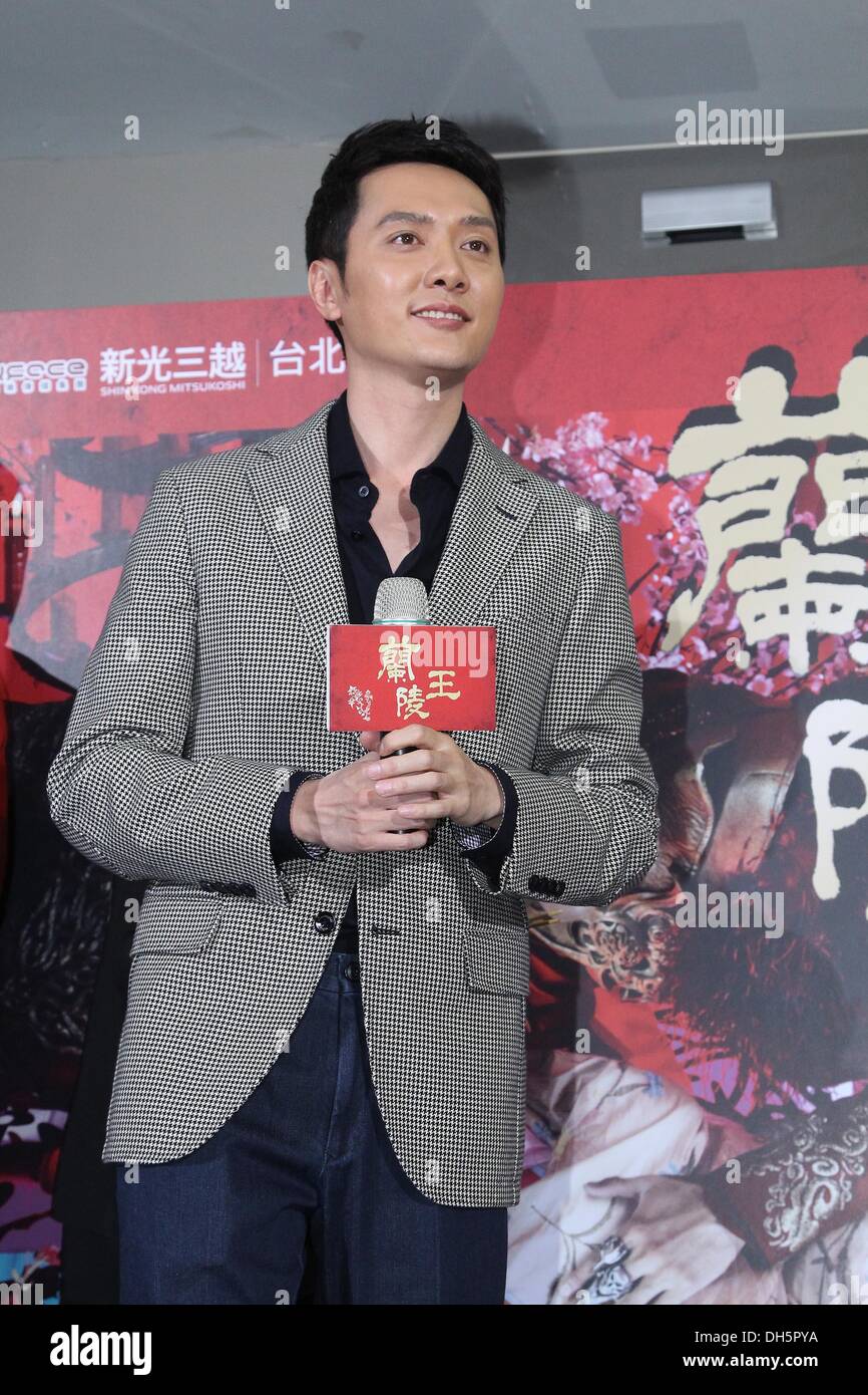Taipei, China. 31st Oct, 2013. Actor Feng Shaofeng shows the costume he ...