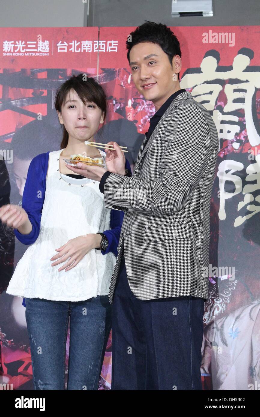 Taipei, China. 31st Oct, 2013. Actor Feng Shaofeng shows the costume he ...