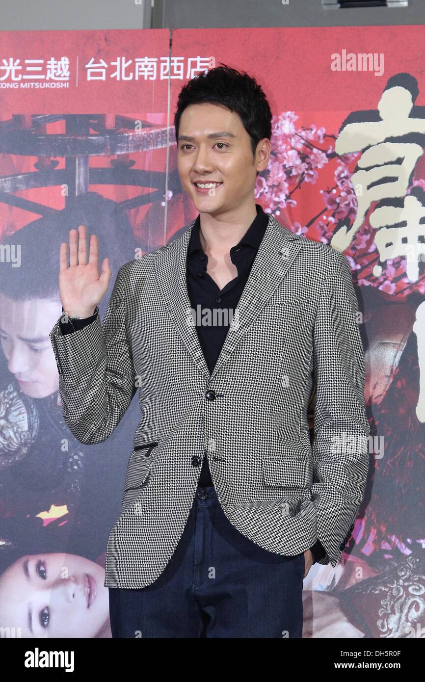 Taipei, China. 31st Oct, 2013. Actor Feng Shaofeng shows the costume he ...