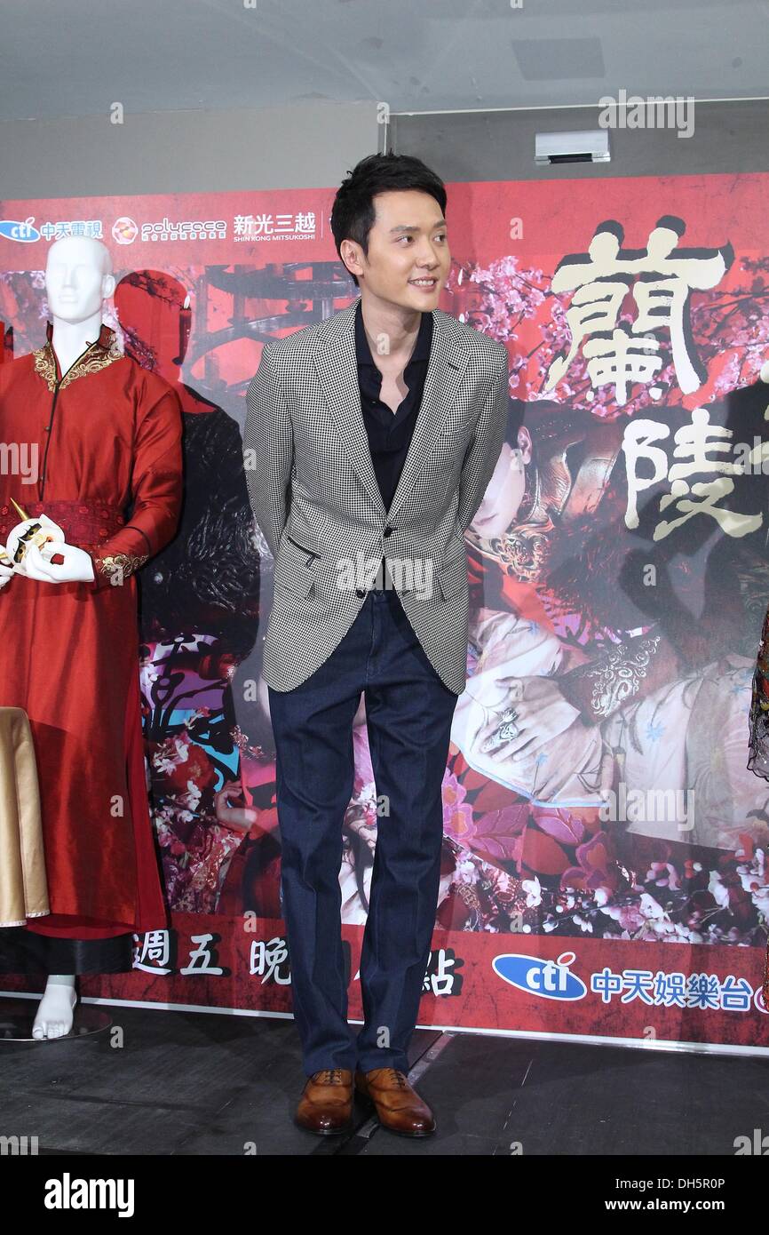 Taipei, China. 31st Oct, 2013. Actor Feng Shaofeng shows the costume he ...