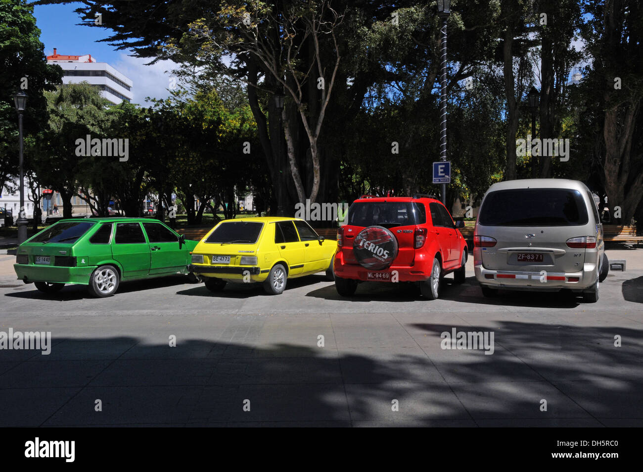 back of four cars parked facing Plaza Munoz Gamero Stock Photo - Alamy