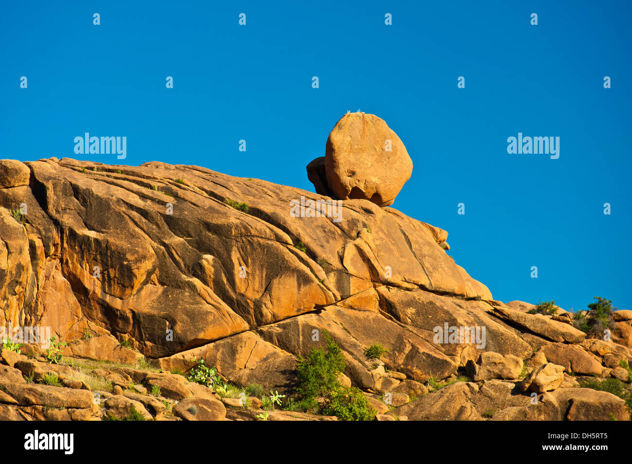 A granite boulder lying on a rock, Little Atlas mountain range ...