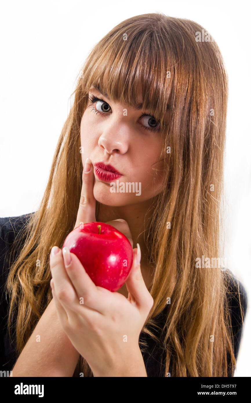 The pretty, young Girl and red apple. Isolated on white Stock Photo - Alamy