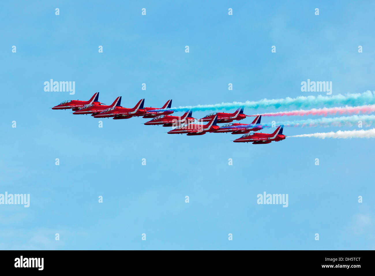 The Red Arrows display team flying in formation Stock Photo - Alamy