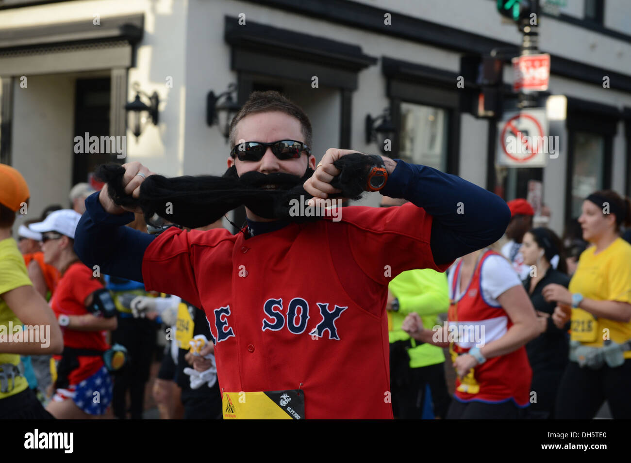 James Roth, from Alexandria, Va., exhibits his beard while running in ...