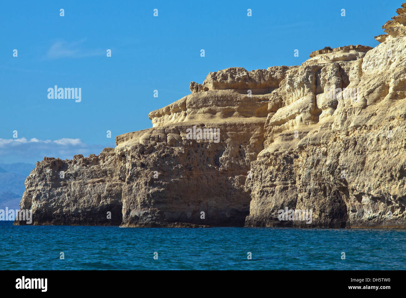 Impressive formations of sandstone rock cliffs at Matala, situated on ...