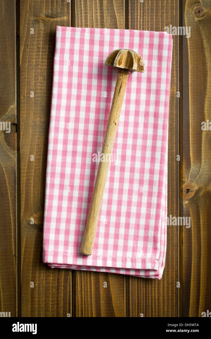 top view of stirring spoon with checkered napkin Stock Photo - Alamy