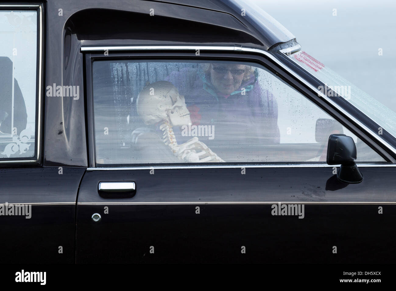 Woman looking at Skeleton through Hearse window at Whitby Goth Weekend ...