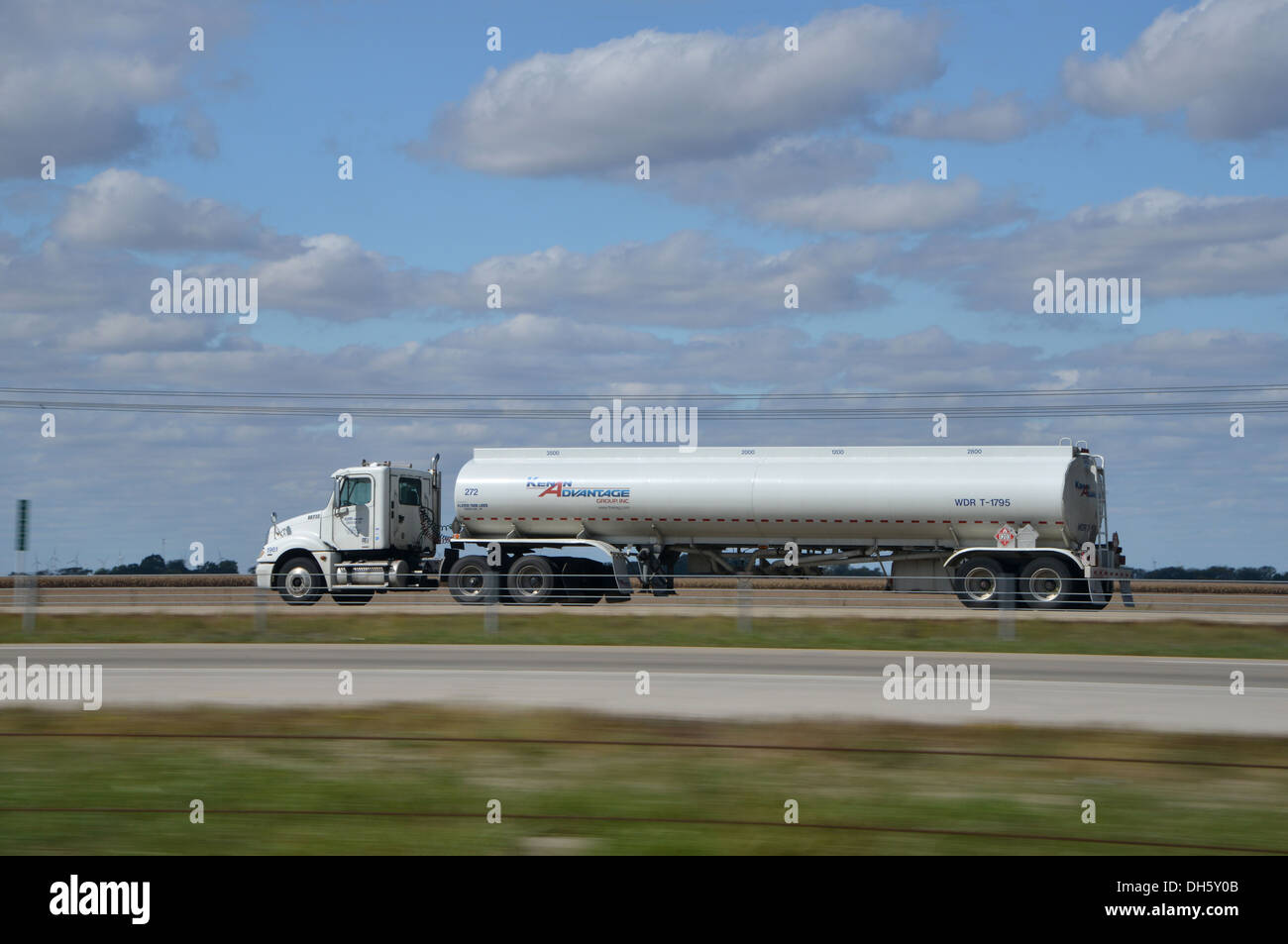 Big Rig American Semi trailer articulated tanker truck speeds along the ...