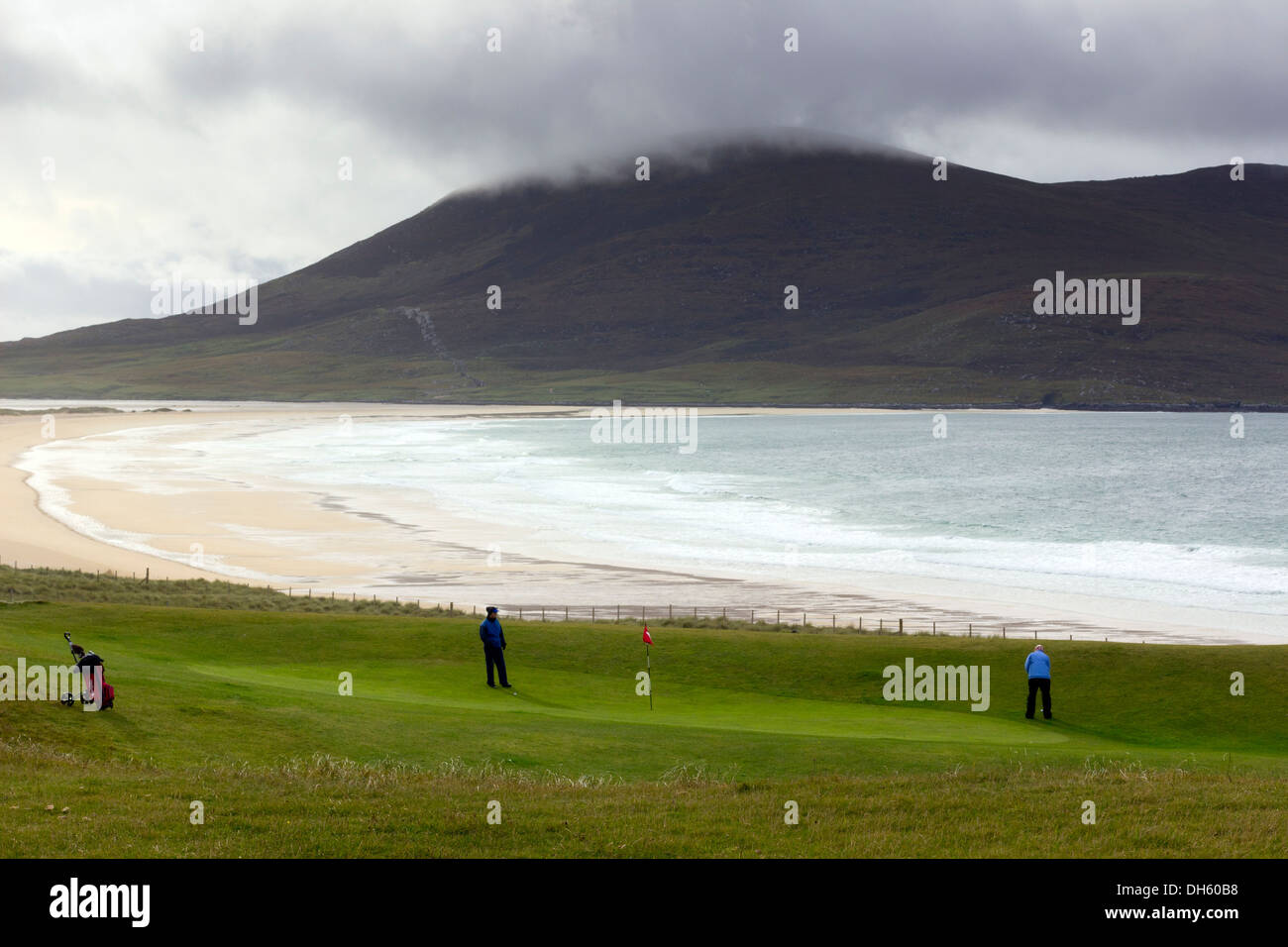 Golfers playing at The Isle of Harris golf course Western Isles ...