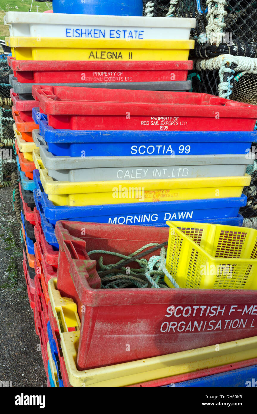 Fish boxes at harbour side Stock Photo - Alamy