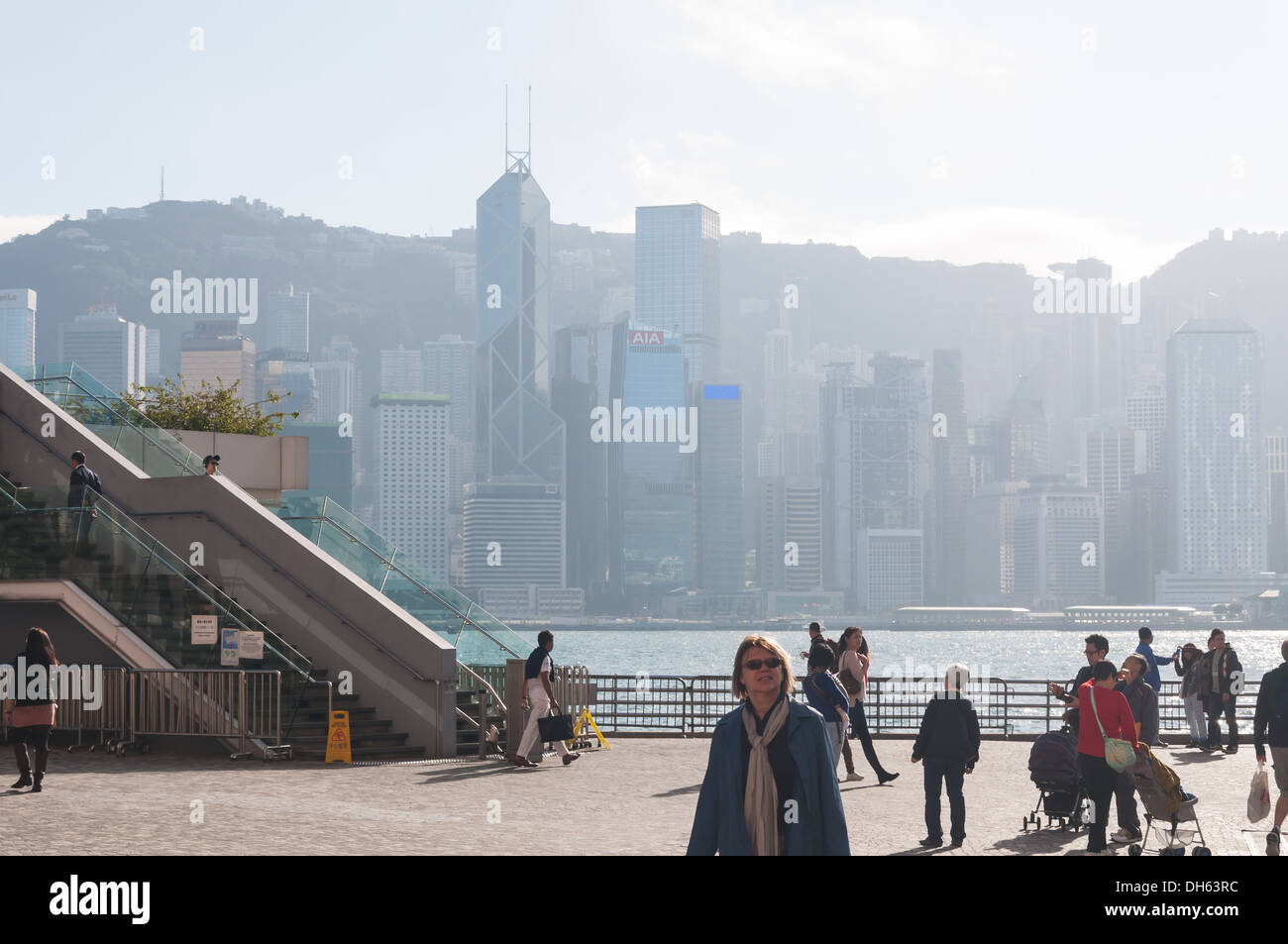 Walking along the Victoria Harbour waterfront in Hong Kong Stock Photo ...