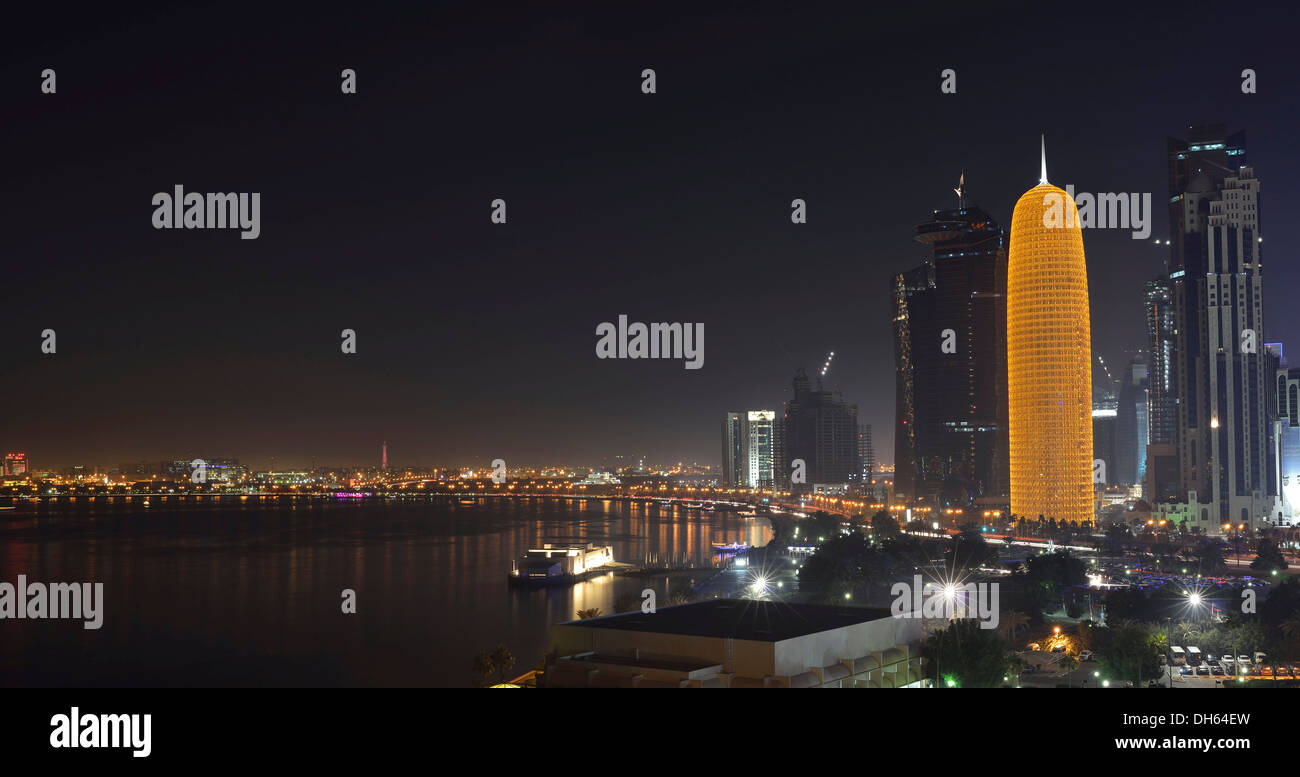Night scene, Corniche waterfront promenade and skyline of Doha with Al ...