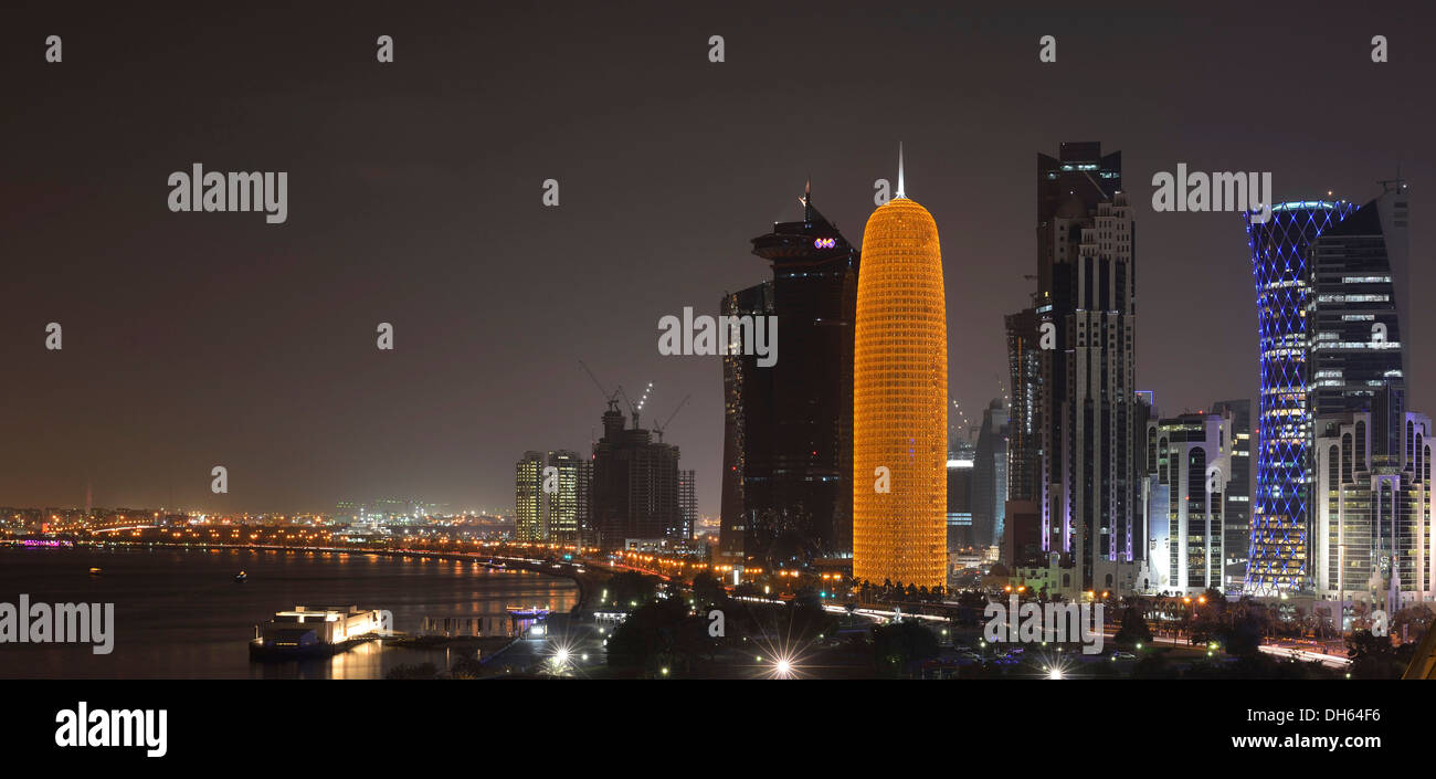 Night scene, Corniche waterfront promenade and skyline of Doha with Al ...