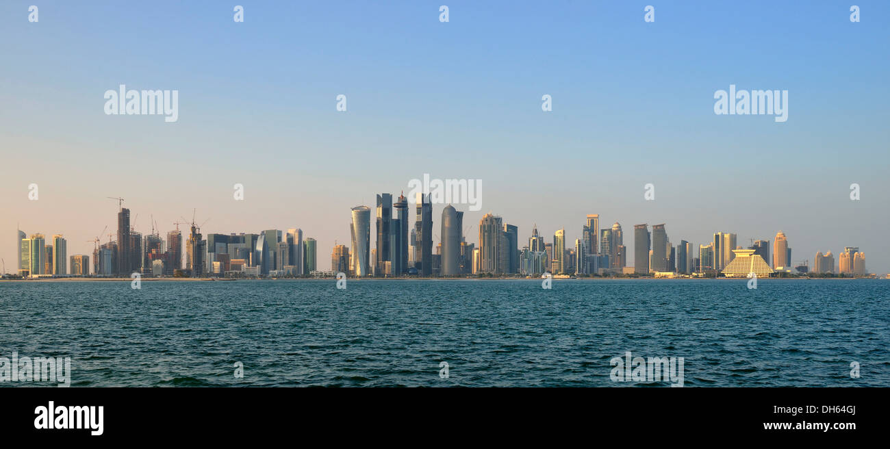 Skyline of Doha in the evening light, Doha Corniche, Doha, Doha, Qatar ...