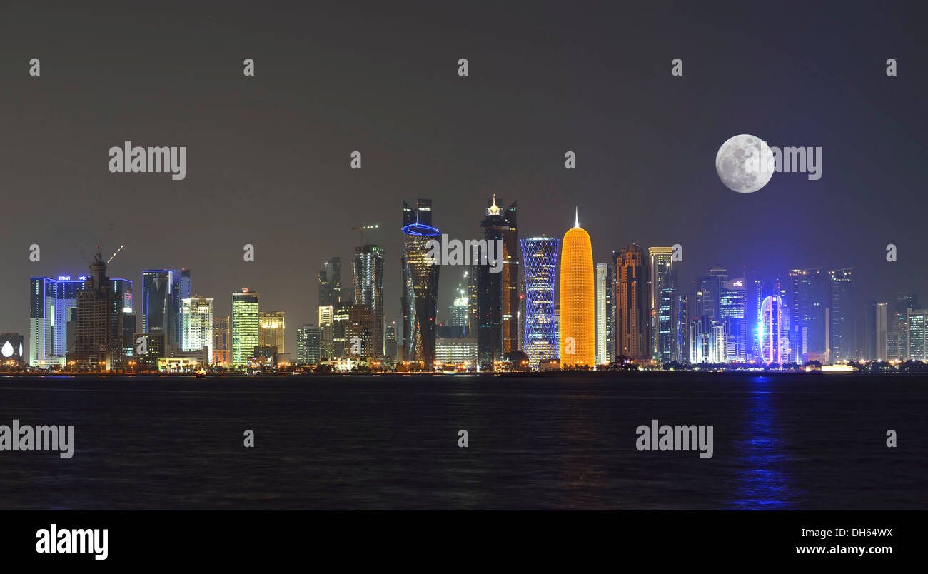 Night skyline of Doha with the Al Bidda Tower, Palm Tower 1 and 2, the ...
