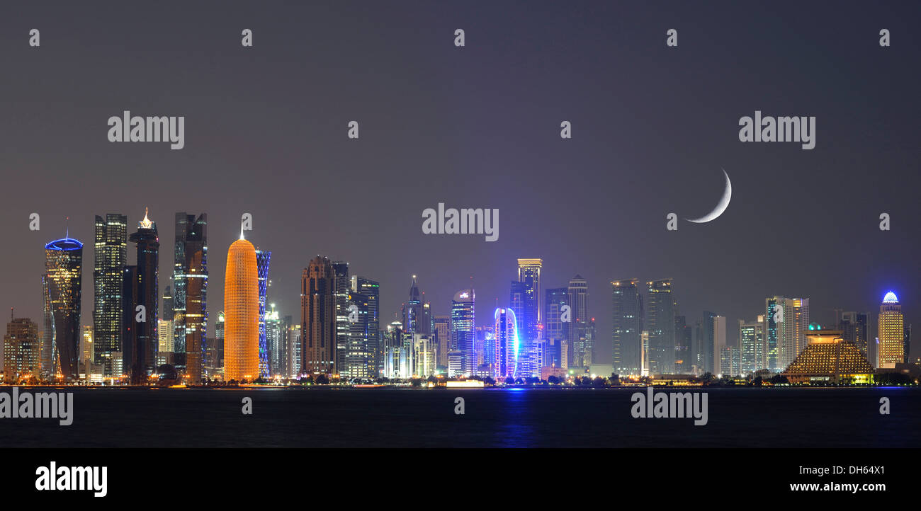 Night skyline of Doha with the Al Bidda Tower, Palm Tower 1 and 2 ...
