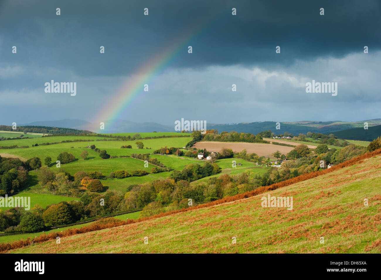Autumn rainbow over Round Oak in the Shropshire hills seen from Hopesay ...