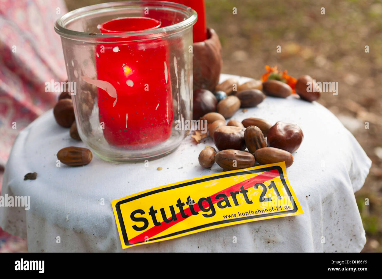 Protest poster and votive candles against the Stuttgart 21 building ...