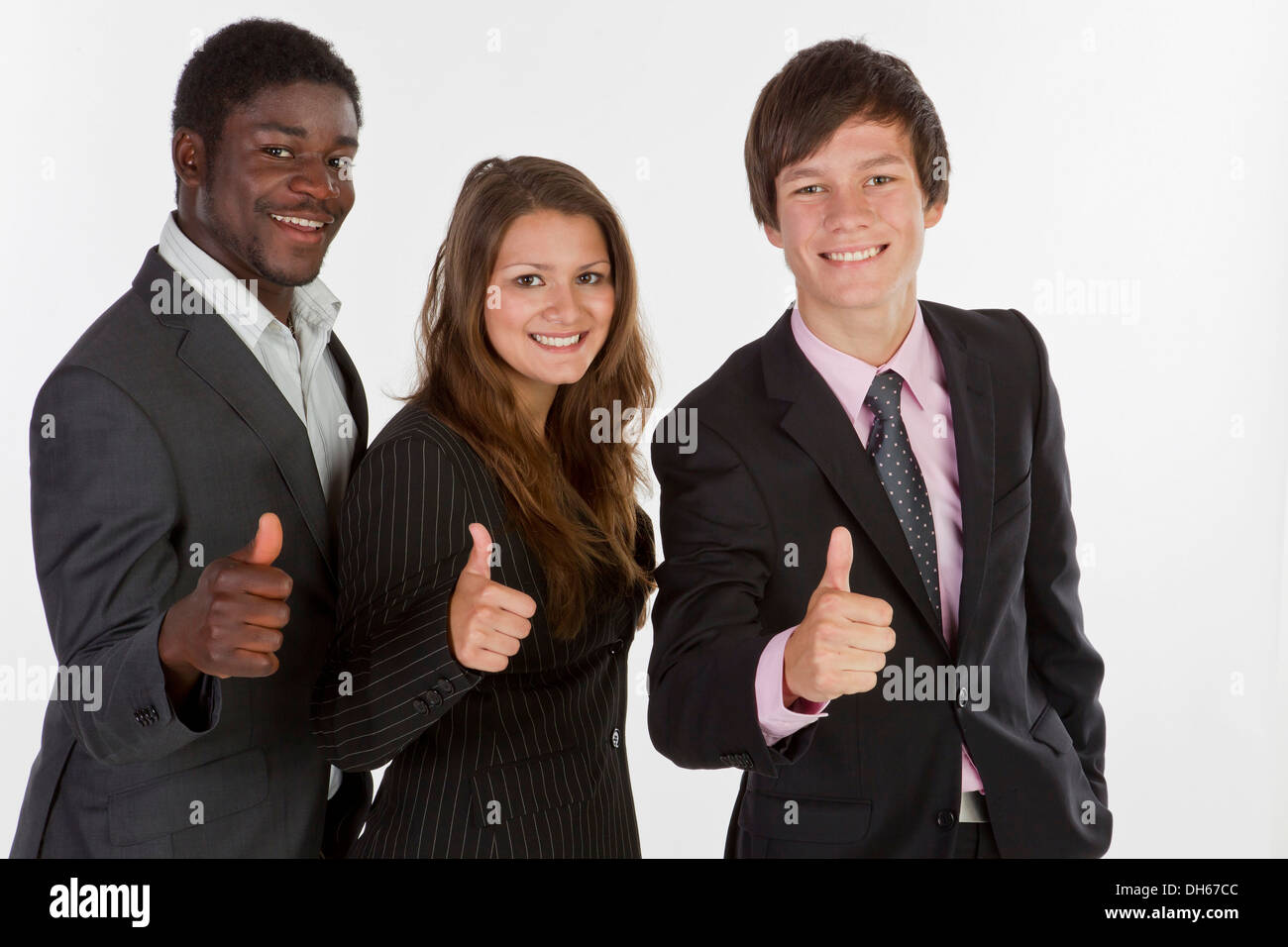 Three young people with different skin colors giving a thumbs up Stock ...