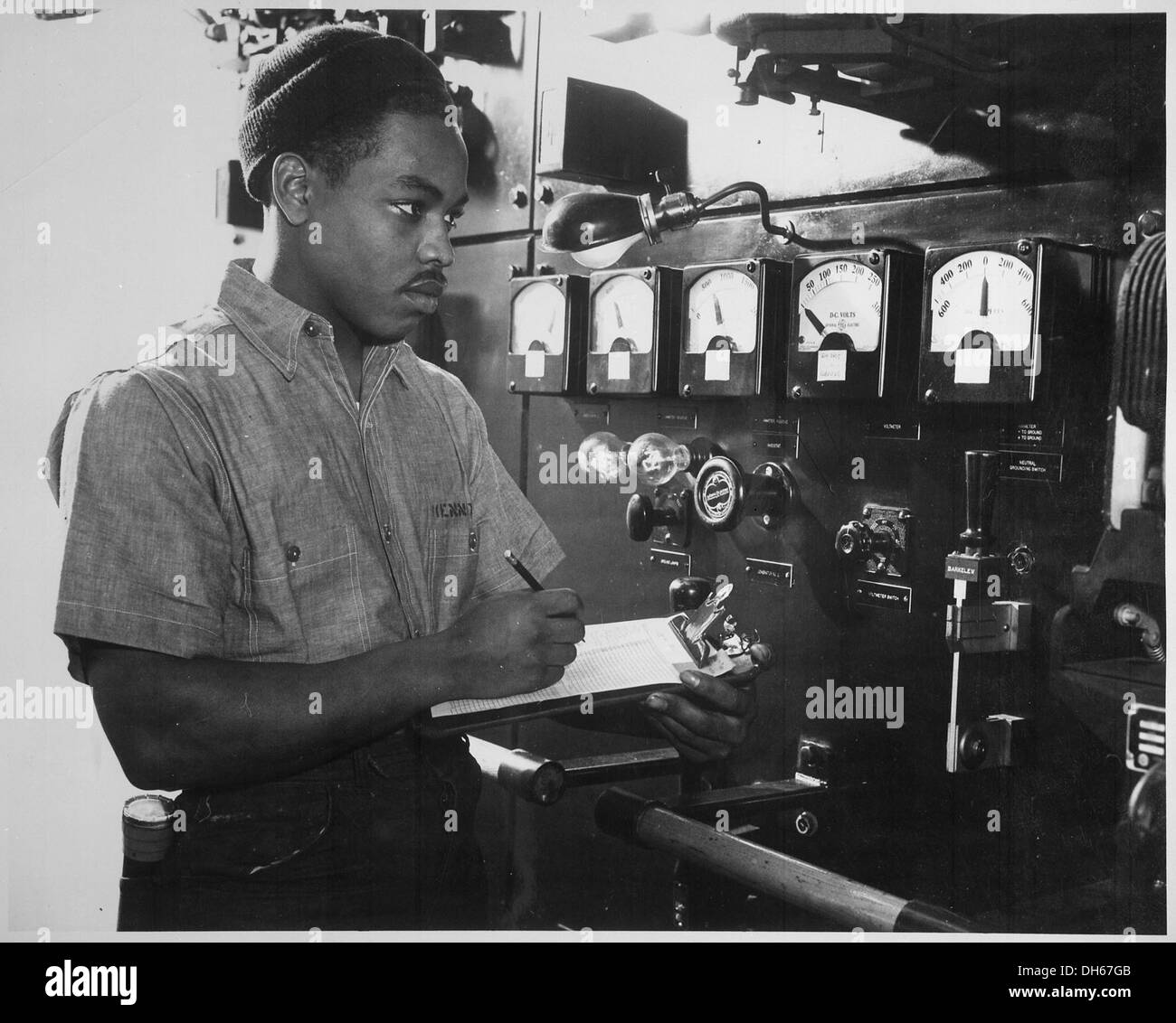 A seaman in the U.S. Maritime Service during World War II, performing ...