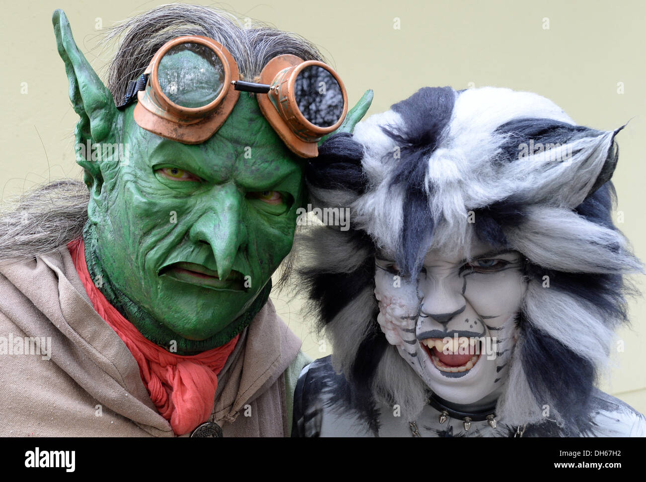 Potsdam, Germany. 25th Oct, 2013. A couple dressed as monsters take ...