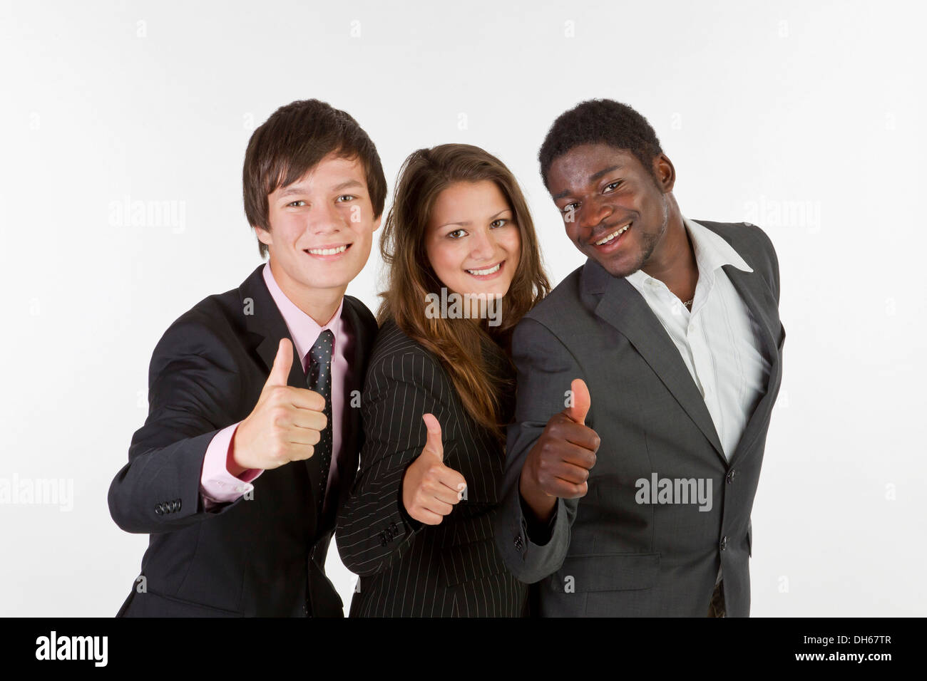 Three young people with different skin colors giving a thumbs up Stock ...