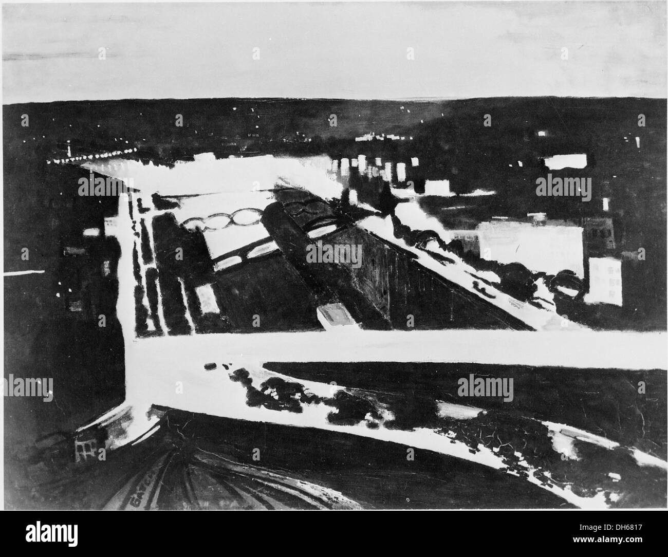 A view of a city at evening in 1933, capturing the lights and urban ...