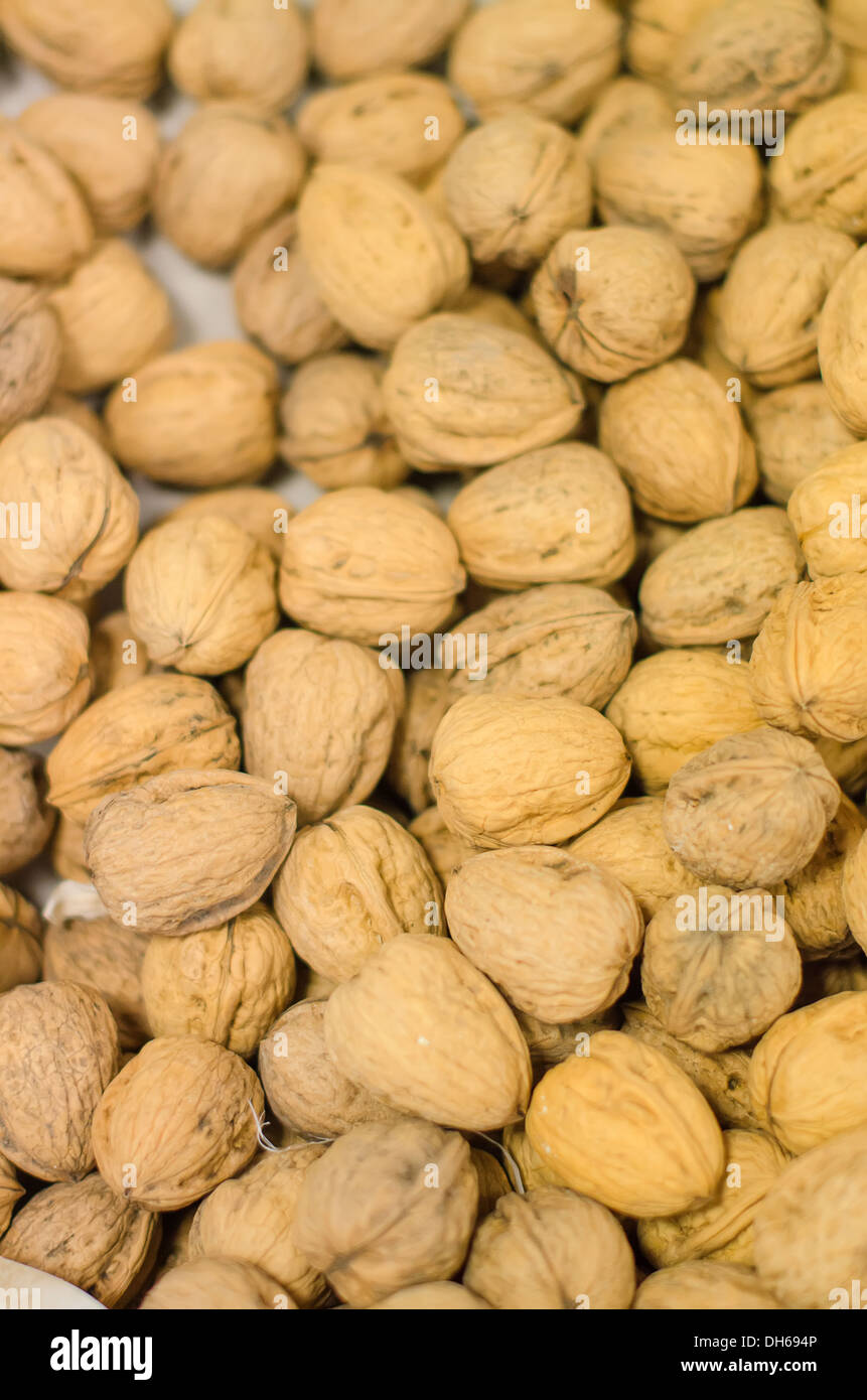 Walnuts in shells in supermarket Stock Photo - Alamy