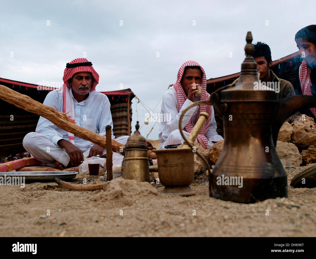 Bedouins at breakfast, tea and Gabouri bread baked in ashes, desert ...