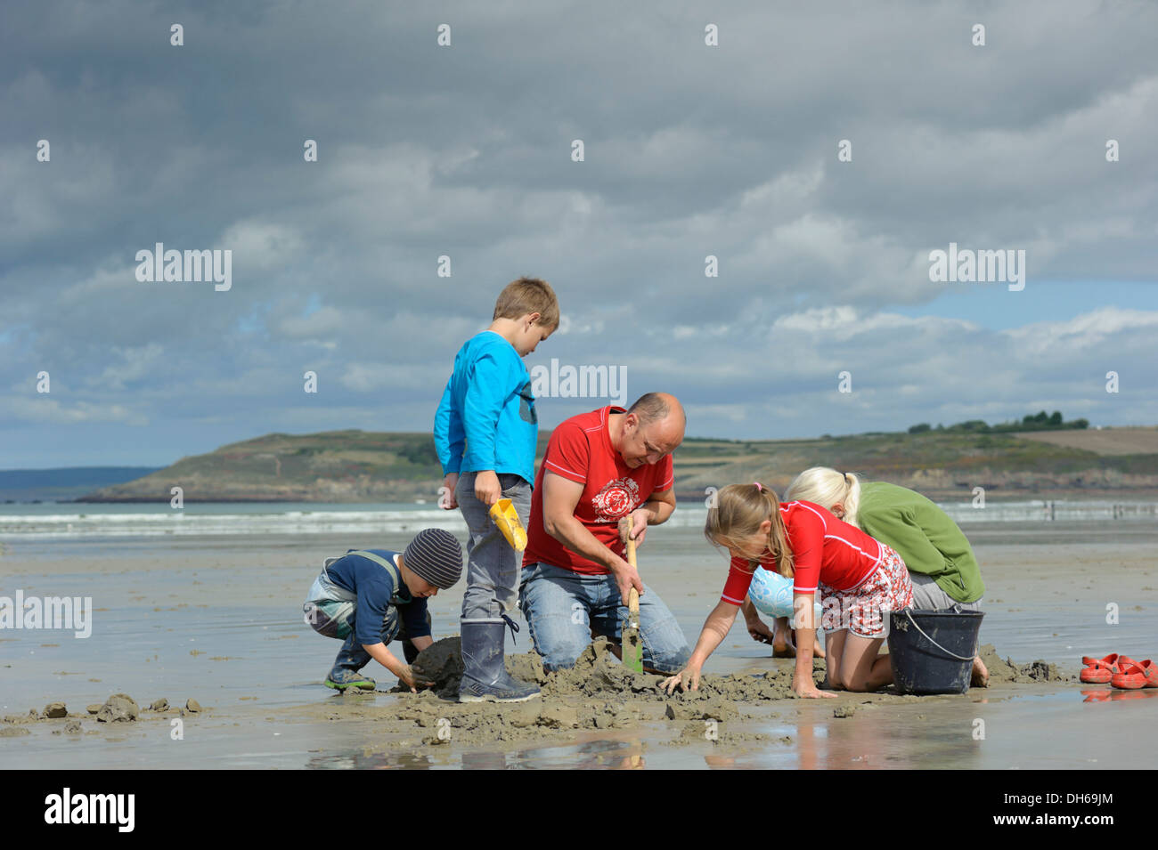 Man Digging For Worms On The Beach High Resolution Stock Photography ...