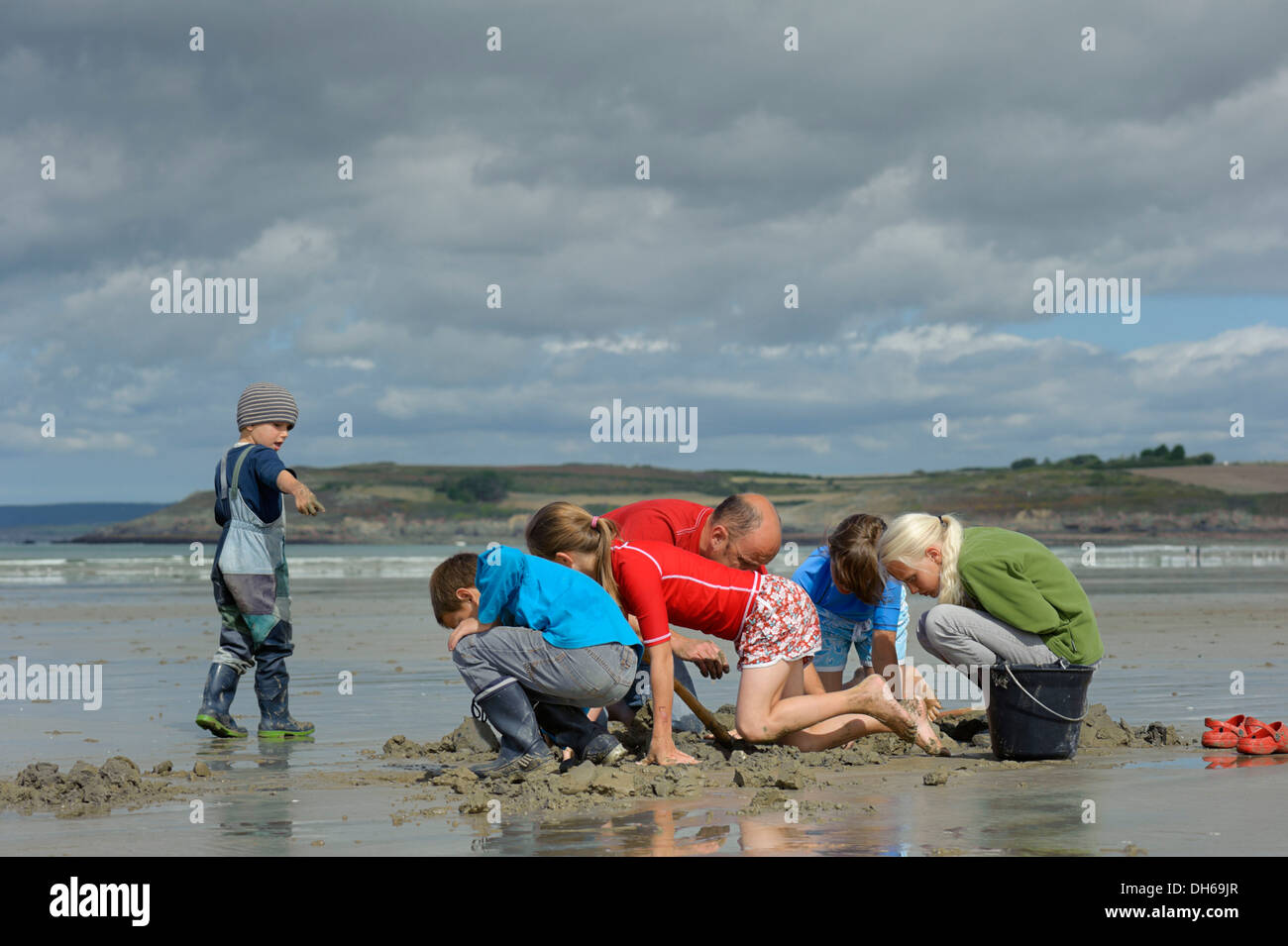 Man Digging For Worms On The Beach High Resolution Stock Photography ...