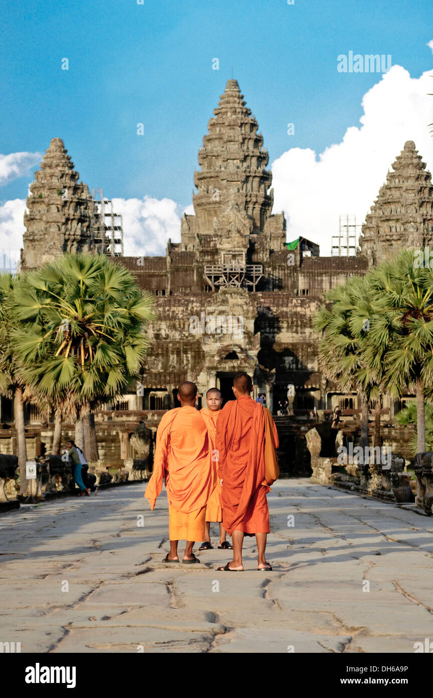 Monks wearing orange robes, Angkor Wat complex, Siem Reap, Cambodia ...