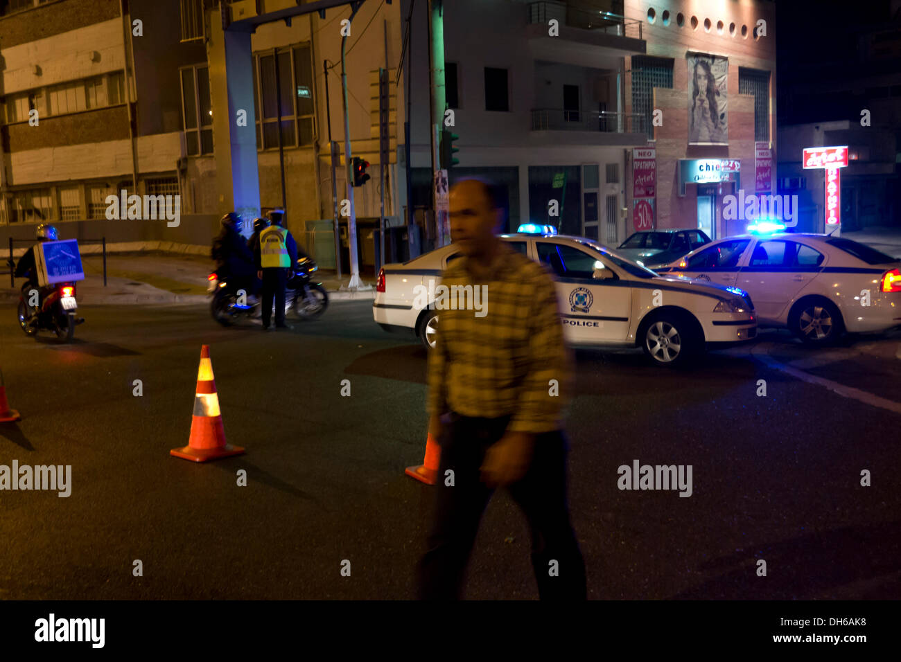 Athens, Greece, November 1st 2013. Police forces secure the crime scene ...