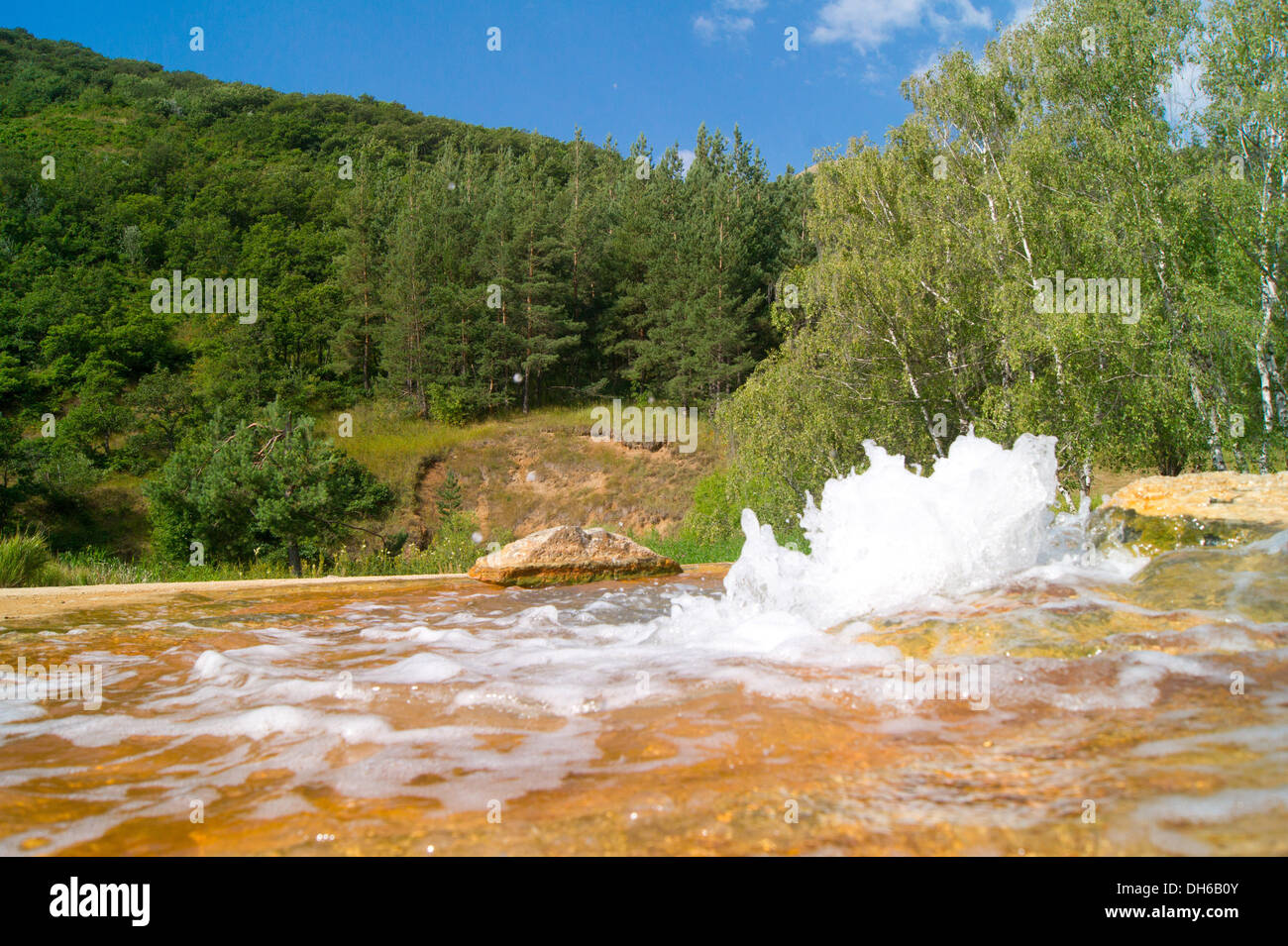 Mineral water raising from underground Stock Photo - Alamy