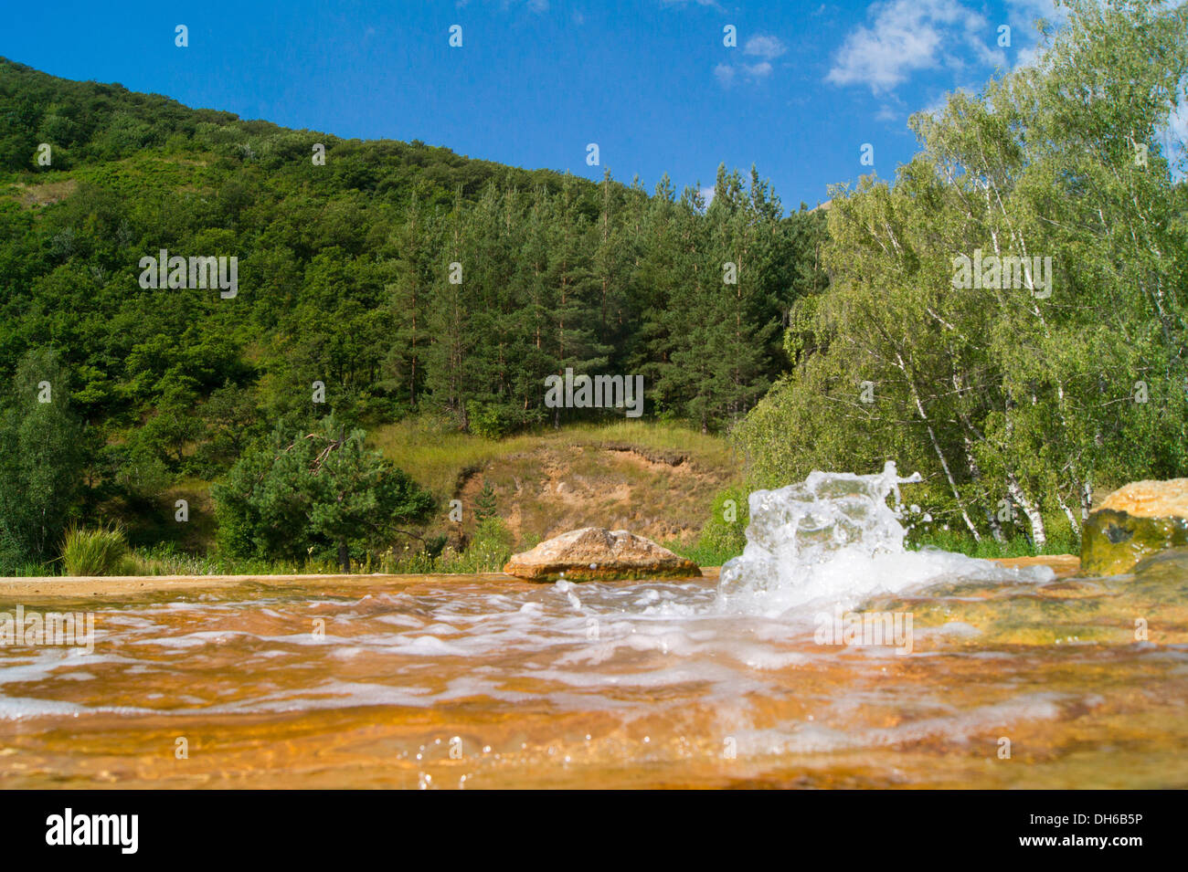 Mineral water raising from underground Stock Photo - Alamy