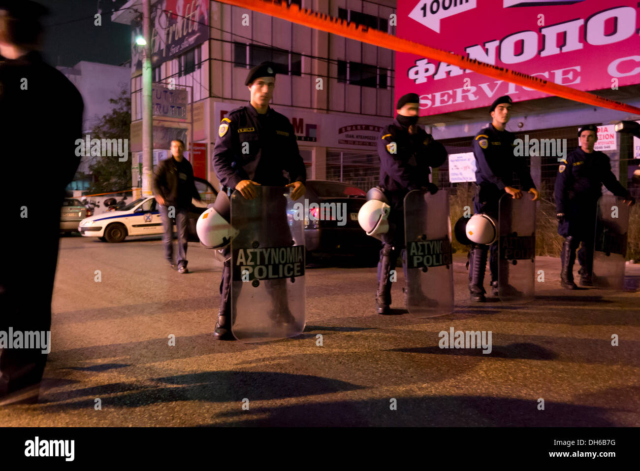 Athens, Greece, November 1st 2013. Police forces secure the crime scene ...